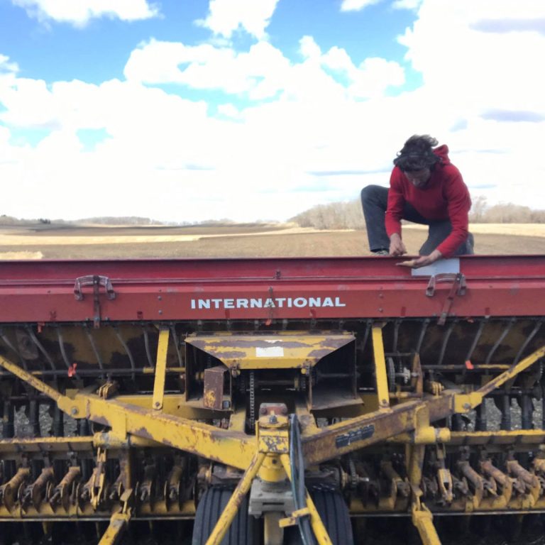 Ryan on seeder - Young Agrarians